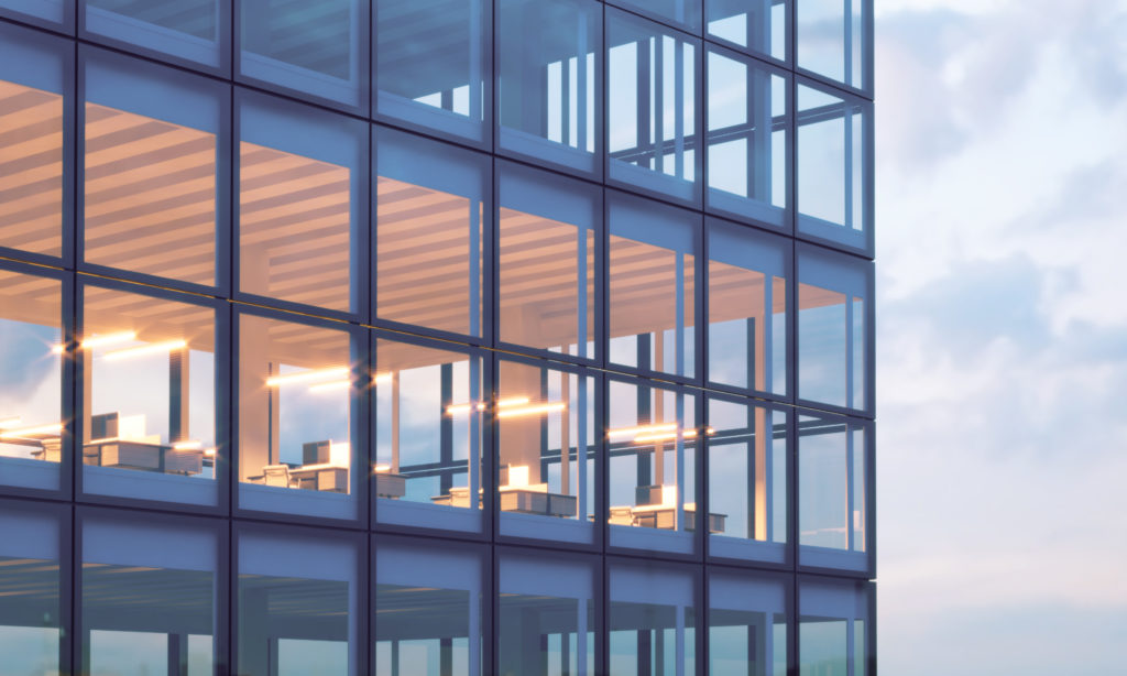 Photo of skyscraper tower.High floor office, interior in evening time ...